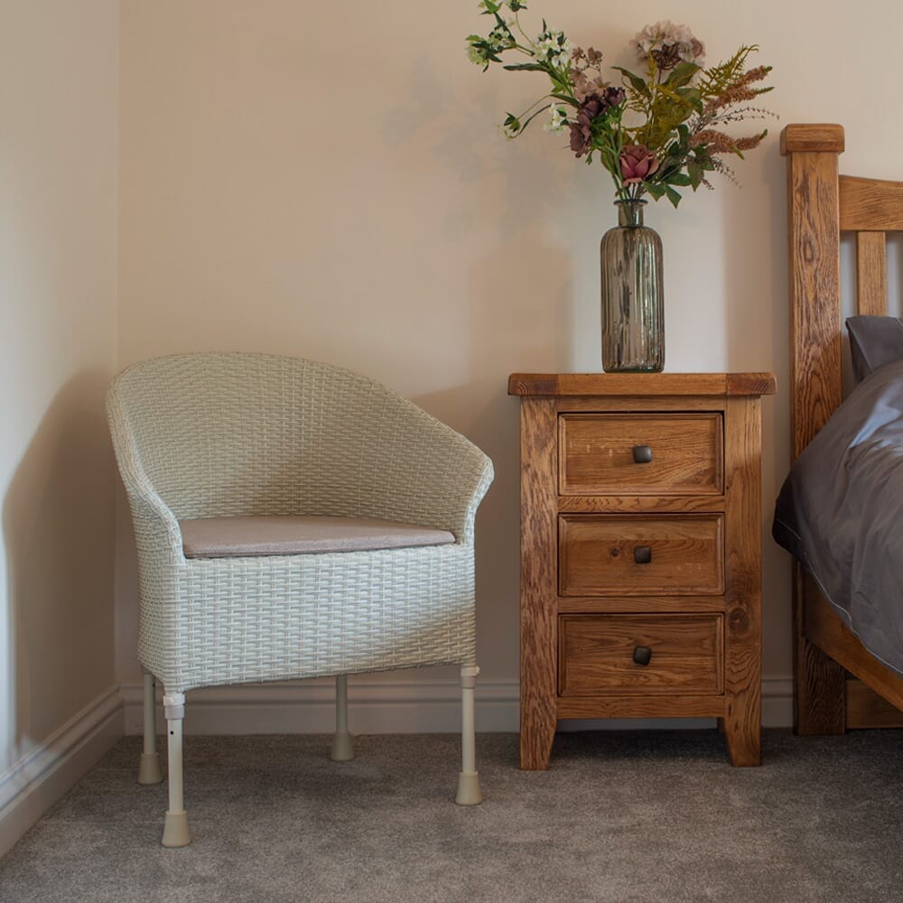 Walton Discreet Adjustable Commode from Essential Aids